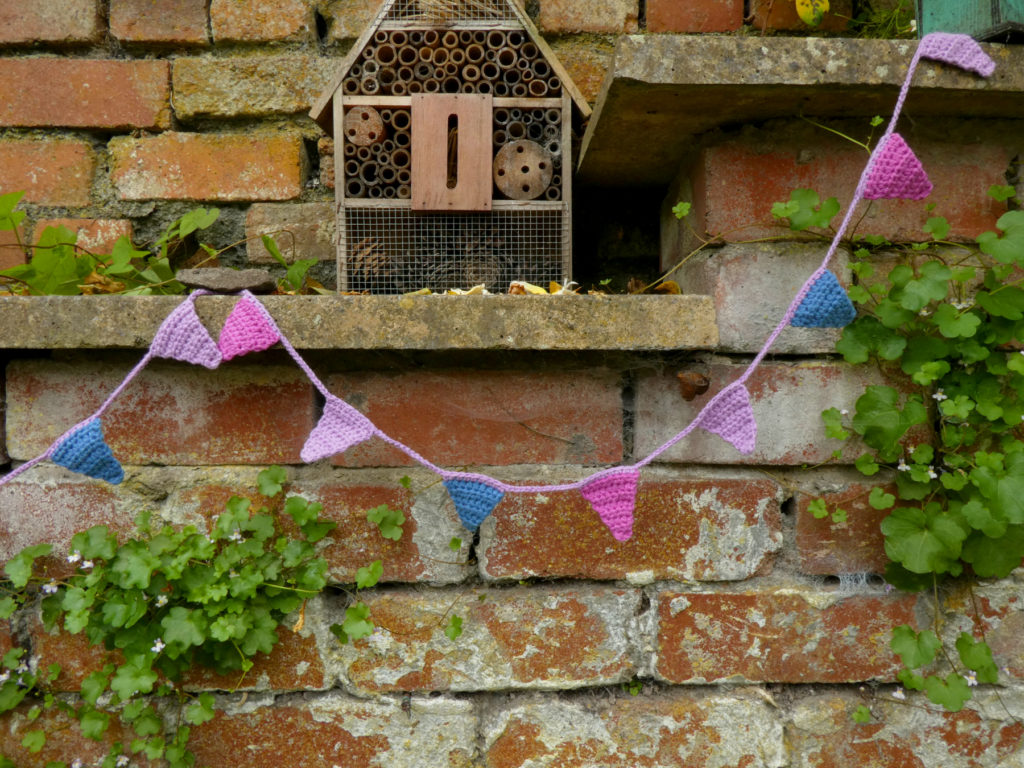 Quick, Colourful Triangle Crochet Bunting